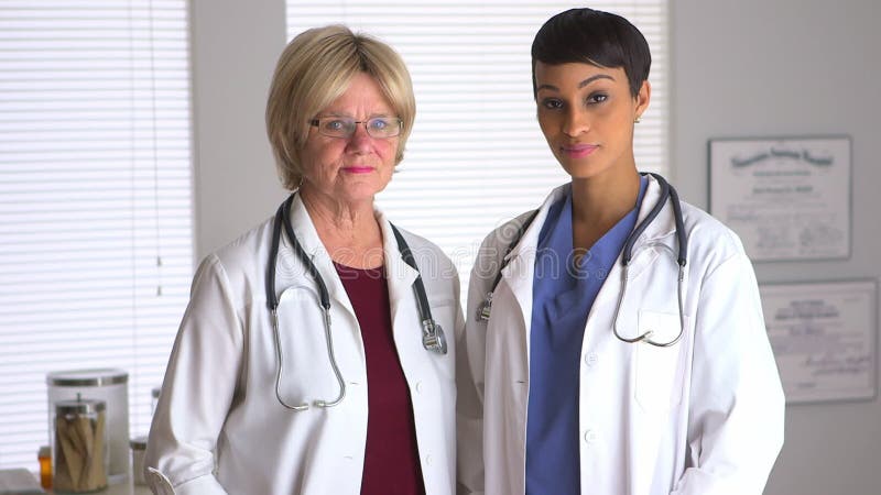 Two Doctors Standing in Office Stock Footage - Video of young, standing ...