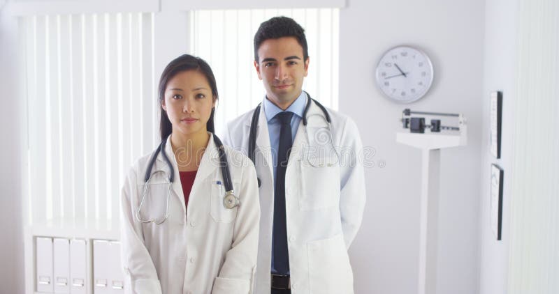 Two Doctors Standing in Office Stock Image - Image of looking, medical ...