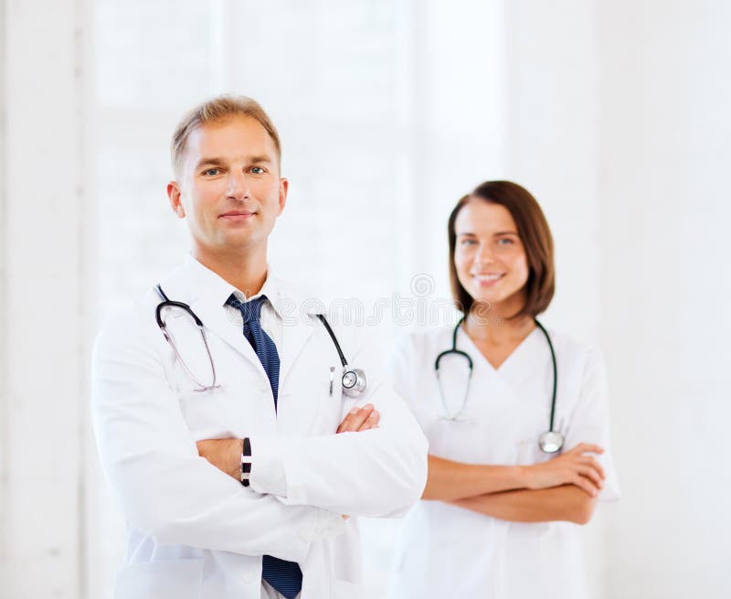 Two Doctors with Stethoscopes Stock Image - Image of disease, happy ...
