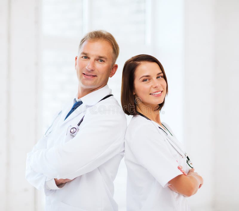 Two Doctors with Stethoscopes Stock Photo - Image of cardio, nurse ...
