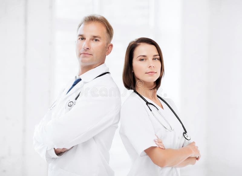 Two Doctors with Stethoscopes Stock Image - Image of pediatricians ...