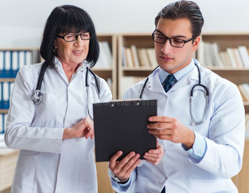 Two Doctors Working in the Lab Stock Image - Image of intern, diagnosis ...