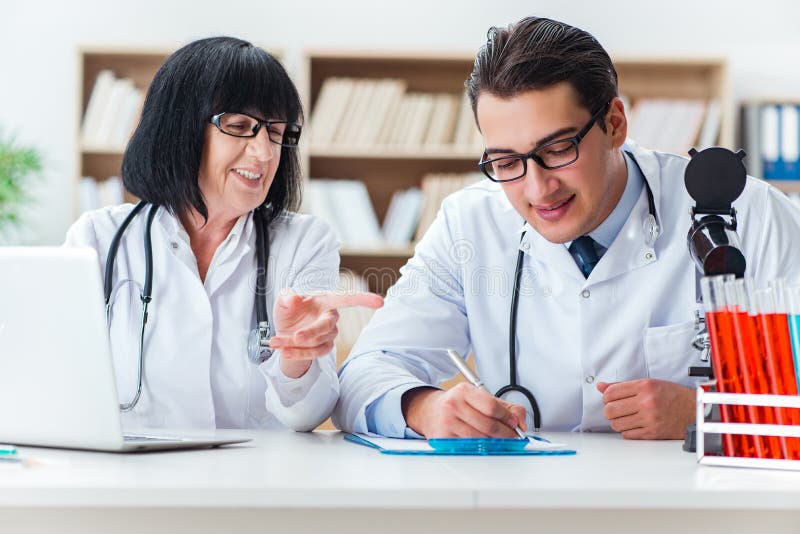 The Two Doctors Working in the Lab Stock Image - Image of analyzing ...