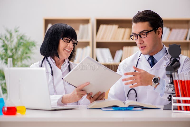 The Two Doctors Working in the Lab Stock Image - Image of lecturer ...