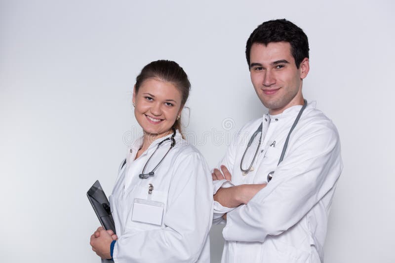 Two doctors stock photo. Image of uniform, male, happy - 67369854