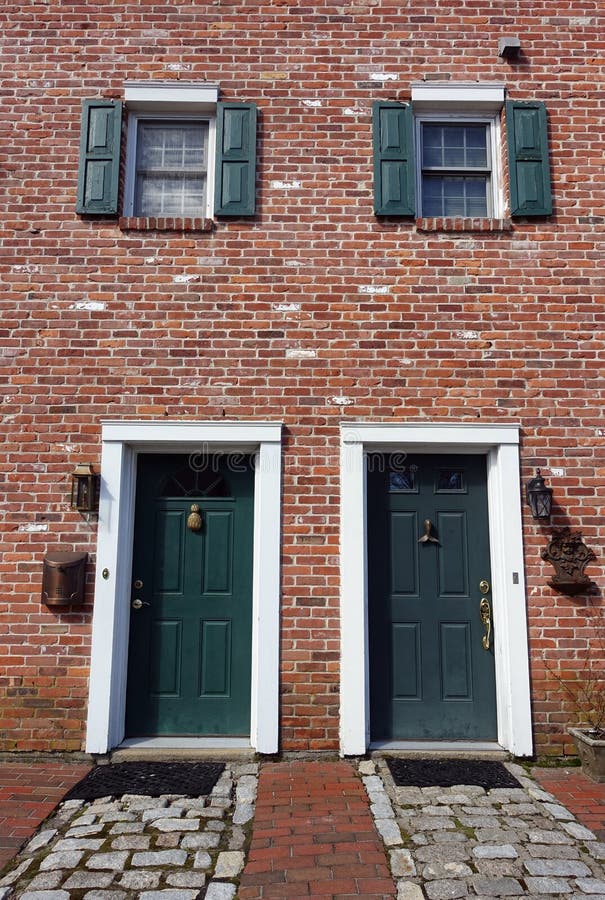 Two Doors Side-by-Side in an Historic Brick Building Stock Photo ...