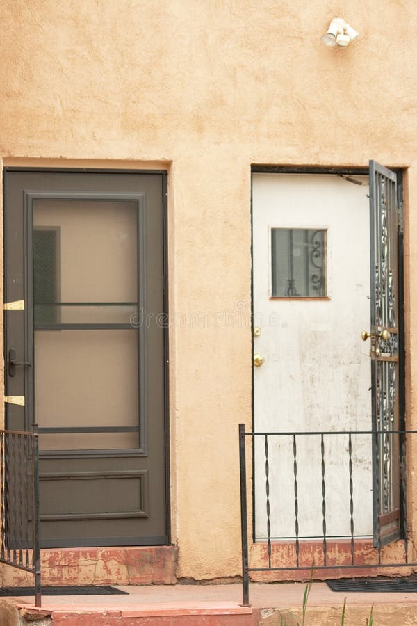 Two Doors stock image. Image of knob, architecture, details - 115412713