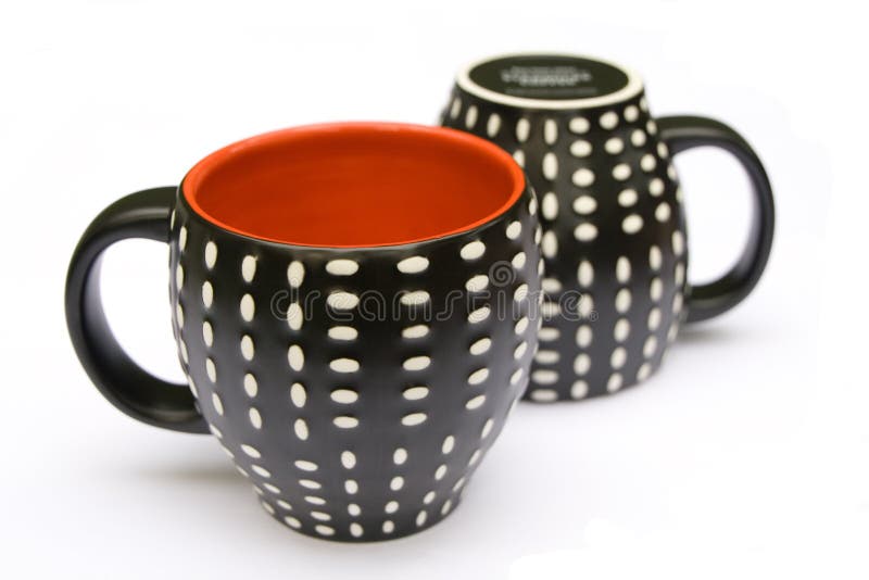 Two dotted coffee mugs stock photo. Image of drinks, pottery - 10489774