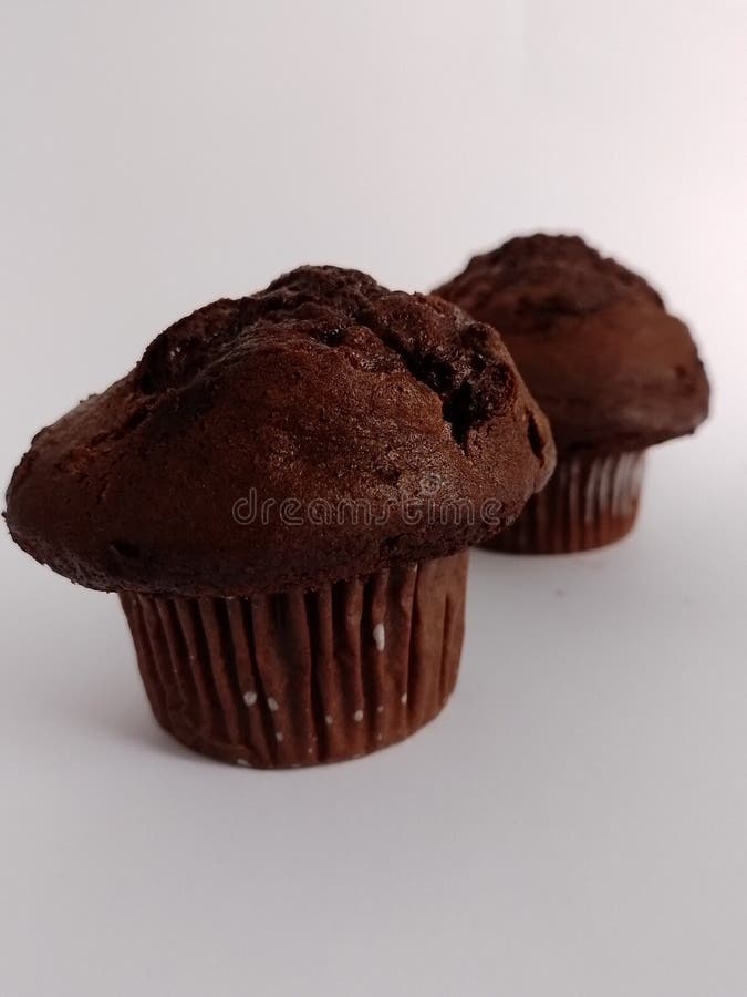 Two Double Chocolate Muffins on a White Background Stock Photo - Image ...