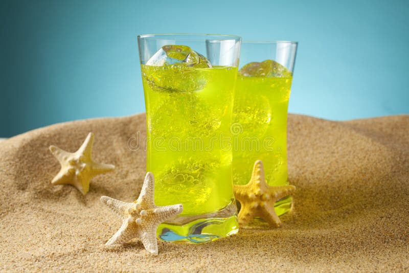 Two drinks on the beach stock image. Image of vacation - 60151373