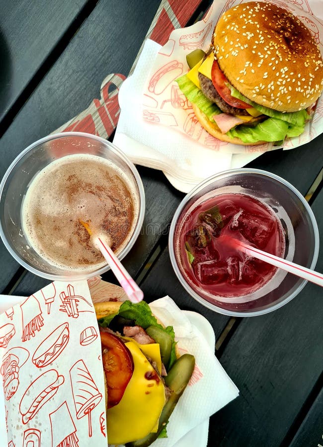 Two Drinks and Two Burgers in a Summer Open-air Bistro Stock Photo ...