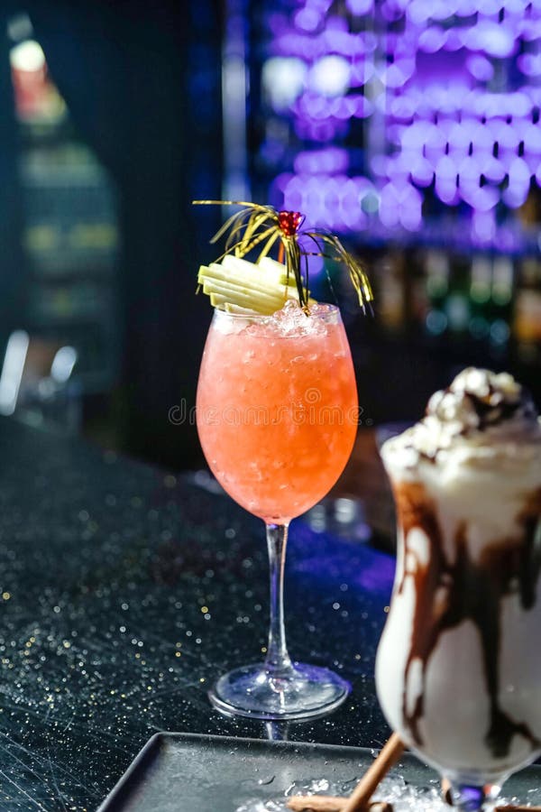 Two Drinks Resting on a Table Outdoors Stock Photo - Image of hanging ...