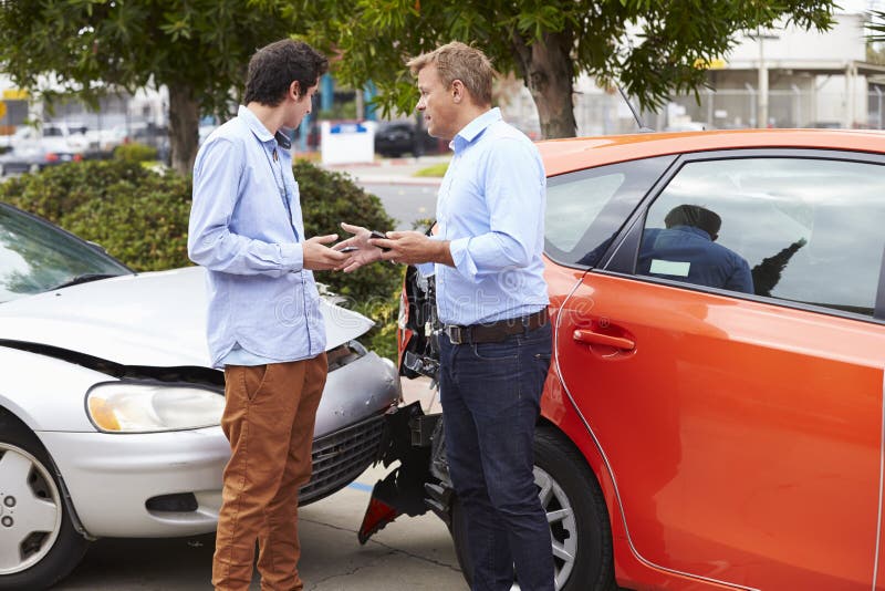 Two Drivers Exchange Insurance Details after Accident Stock Photo ...