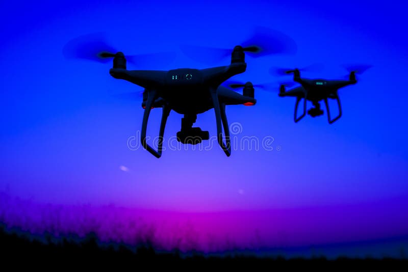 Two drones in the sky stock image. Image of drones, drone - 101954519