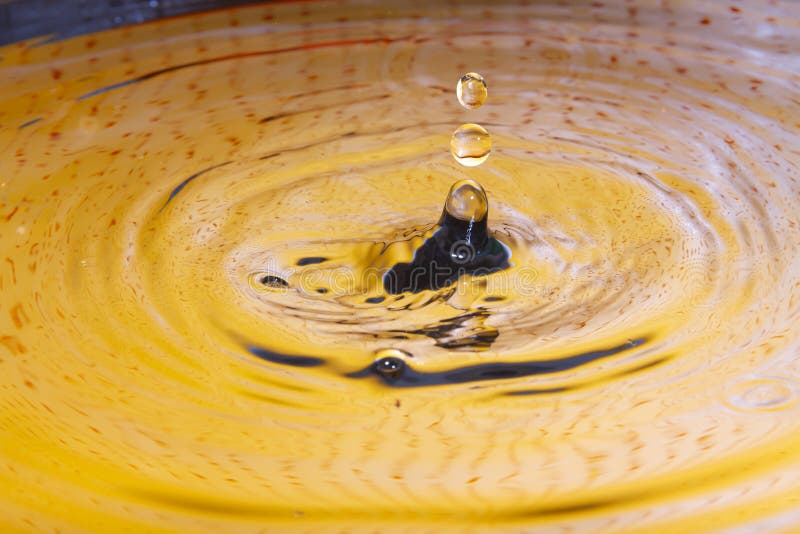 Two Droplets of Water Fall on the Surface of the Water Stock Photo ...
