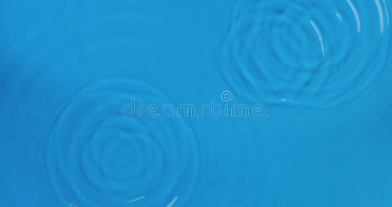 Two Drops of Rain Fall into Blue Water. Top View Stock Footage - Video ...