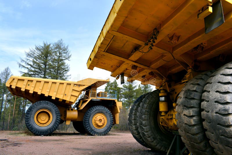 Two Dump Trucks at the Rear and Side Stock Photo - Image of large ...