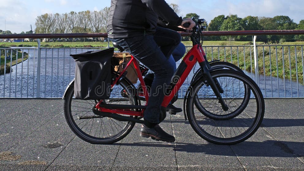 Two Dutch Cyclists in Action Stock Photo - Image of active, hardenberg ...
