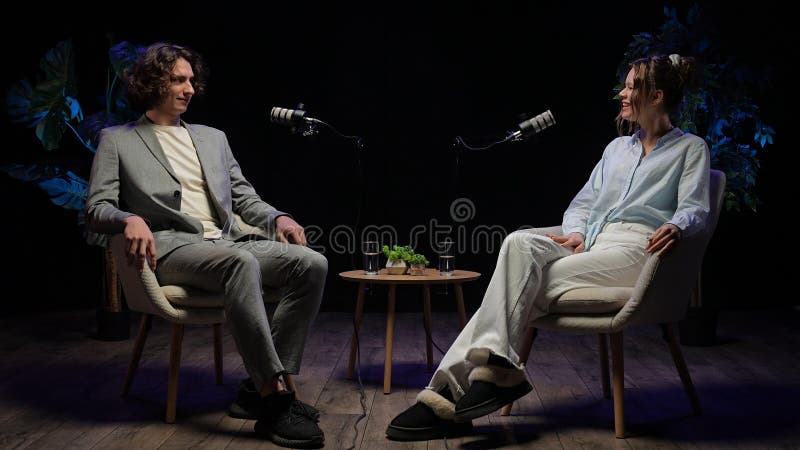 Engaging Conversations Unfold in a Modern Podcast Studio with Expert ...