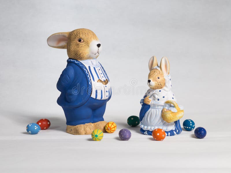 Two Easter Bunnies. Man and Woman with Eggs and Basket Stock Image ...
