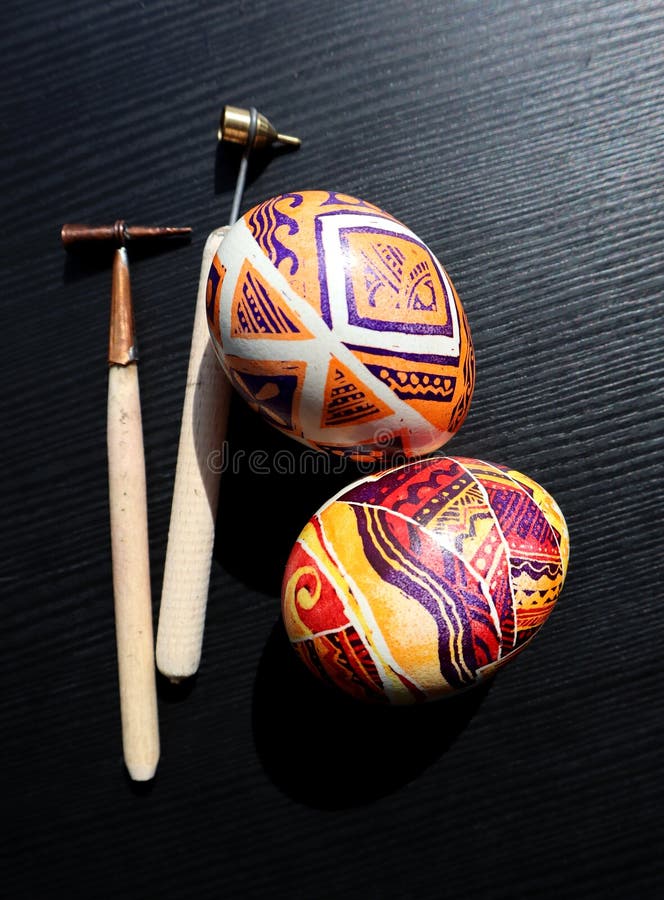 Two Easter Eggs Painted with Ornaments. Two Drawing Tools Next To Them ...