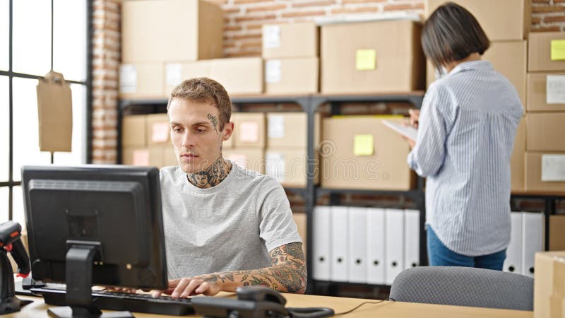 Two Ecommerce Business Workers Using Computer Taking Notes at Office ...