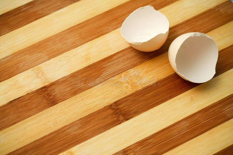Two egg shells stock photo. Image of eggs, wood, board - 12663674