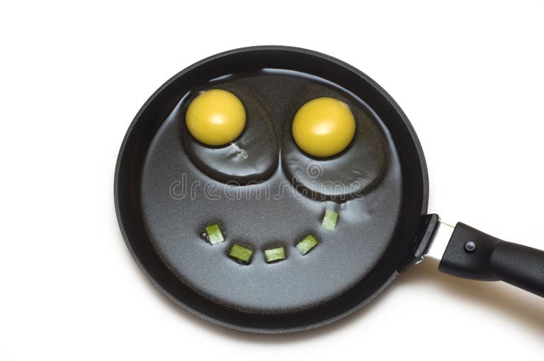 Two Eggs on a Frying Pan with a Smile Stock Image - Image of crude ...
