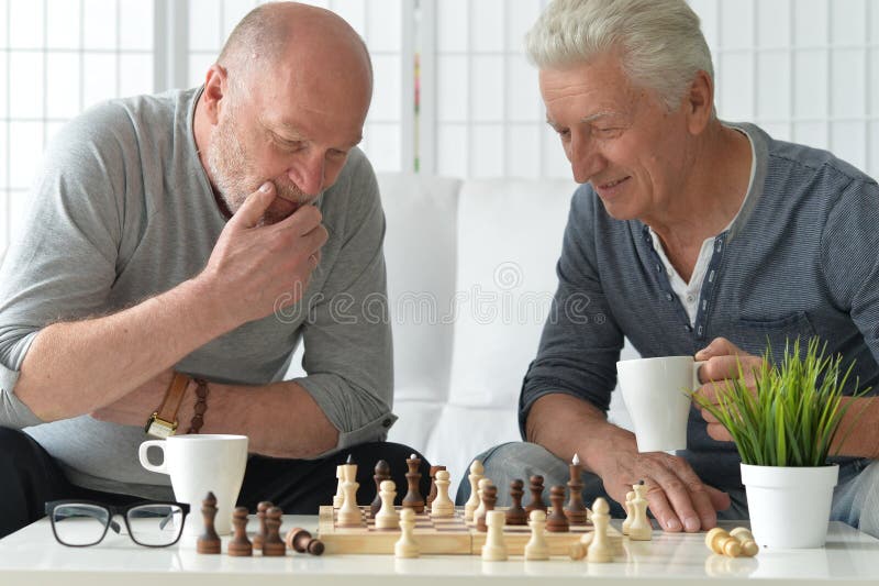Two Old Senior Men Playing Chess at Home Stock Image - Image of people ...