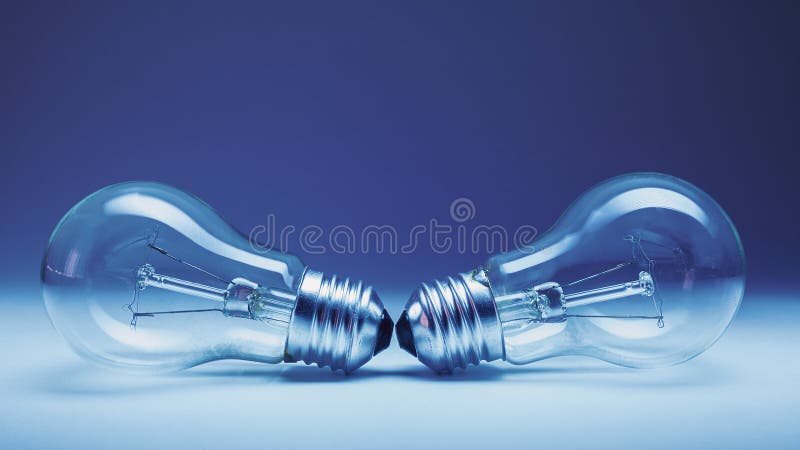 Two Electric Bulbs in Blue stock image. Image of lifestyle - 67689355