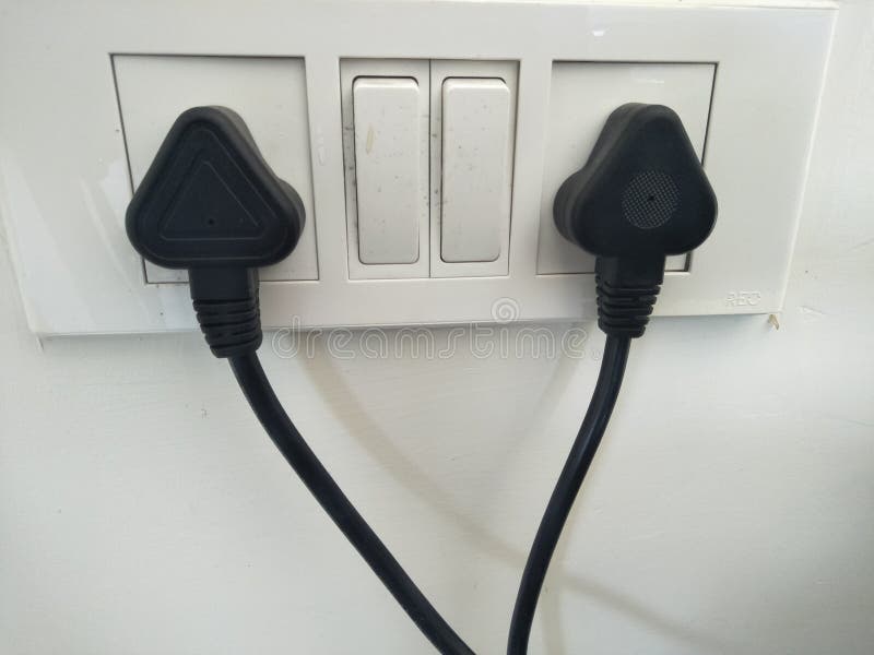 Two Electrical Plugs Connected To Cords Stock Image - Image of outlet ...