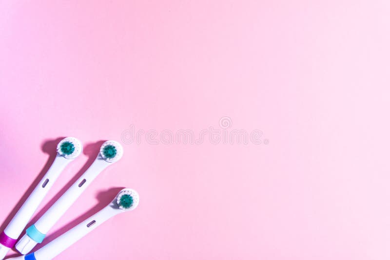 Electrical Toothbrushes on a Soft Light Pink Background Stock Photo ...