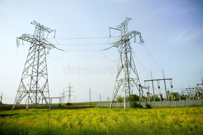 Two Electrical Towers on Blue Sky Background Stock Photo - Image of ...
