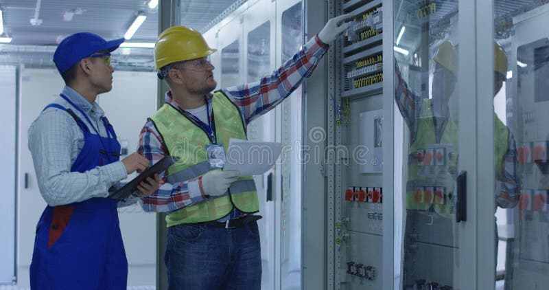 Electrical Utility Workers on Crane Stock Image - Image of electric ...