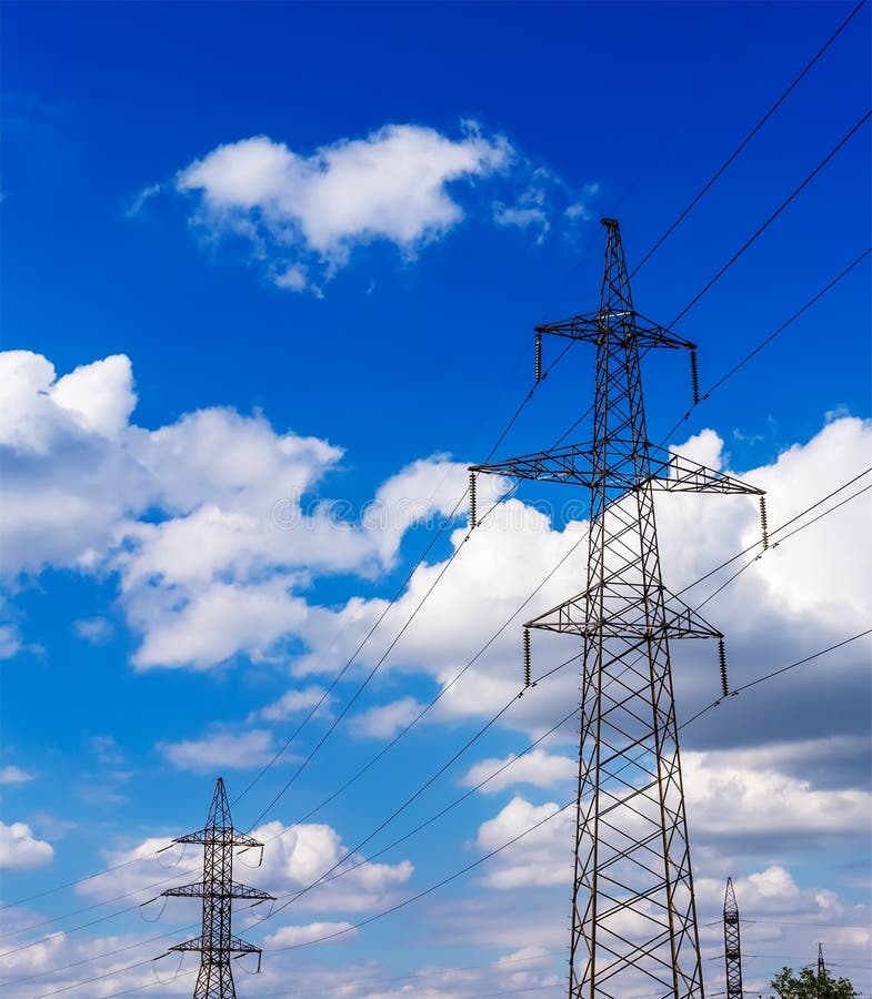 Two electricity pylons stock photo. Image of tower, power - 76751004