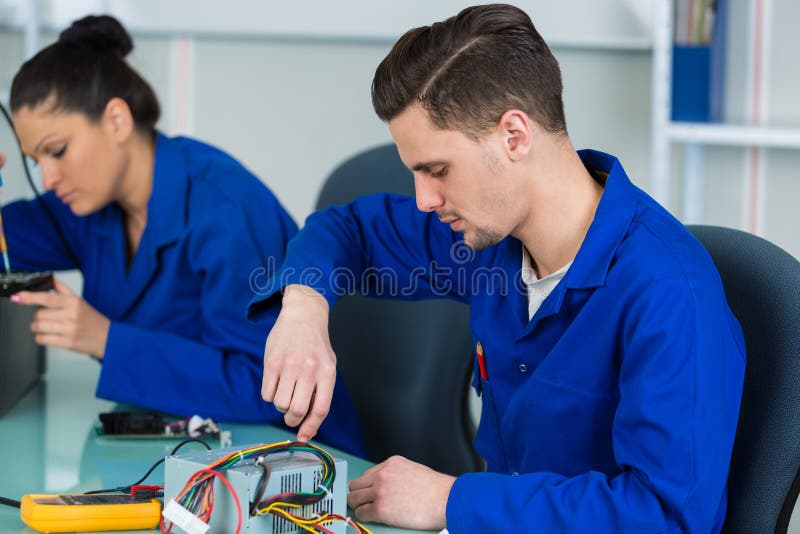 Two Electronic Students in Class Stock Image - Image of pupil, study ...