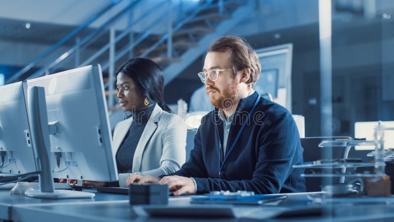 People Working Computers Two Screens Stock Photos - Free & Royalty-Free ...