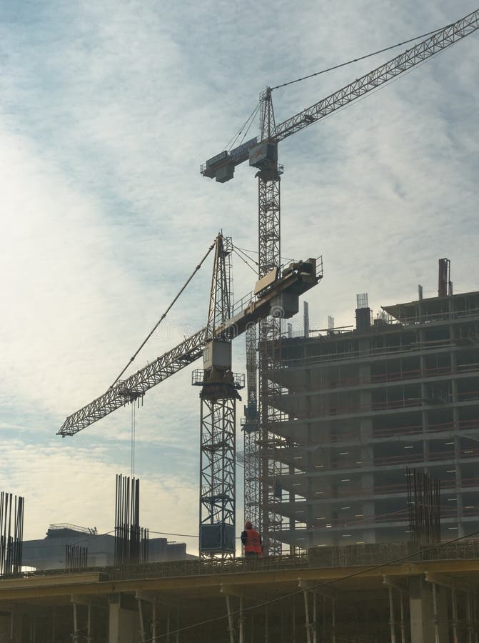 Two elevating cranes stock image. Image of business, technology - 46167037