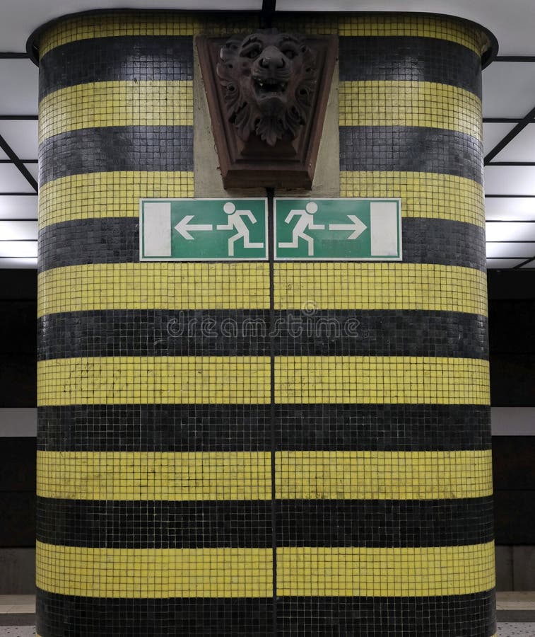 Two Emergency Exit Signs in a Subway Station Stock Image - Image of ...