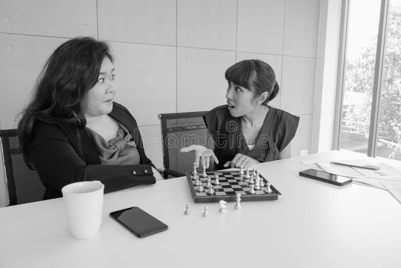 Two Employee Women Playing Chess in Work Space Stock Photo - Image of ...