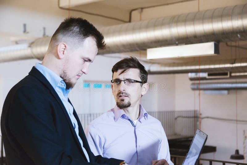 Two Employee Working Together at Coworking Open Office. Stock Photo ...