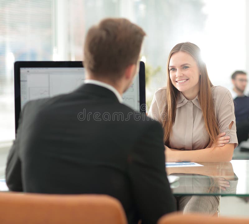 Two Employees Discussing Electronic Data at Meeting Stock Photo - Image ...