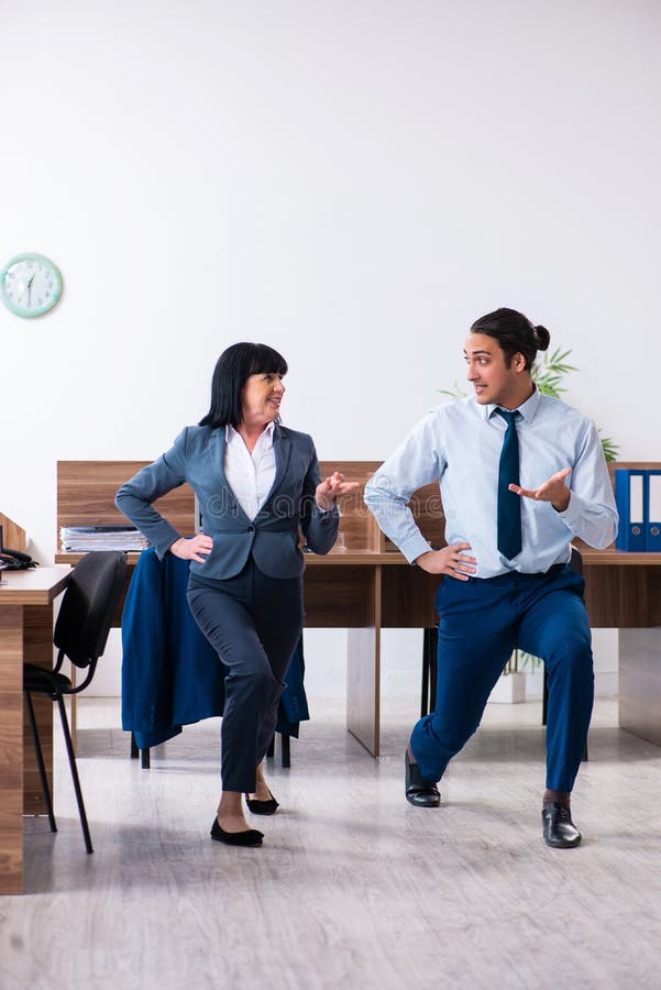 Two Employees Doing Sport Exercises in the Office Stock Image - Image ...