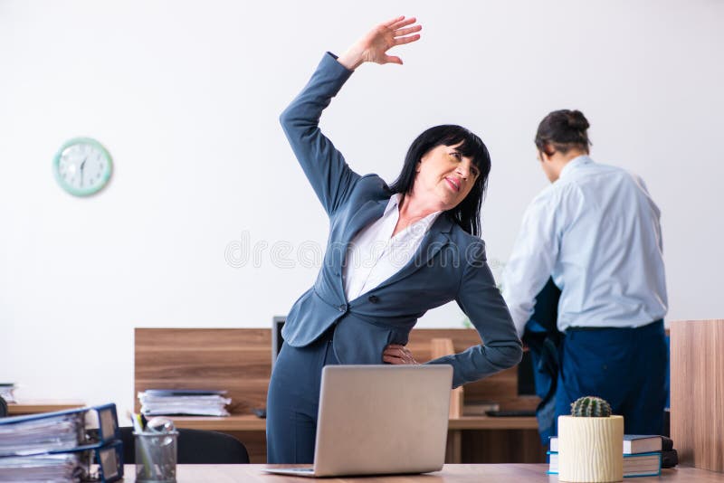 Two Employees Doing Sport Exercises in the Office Stock Image - Image ...