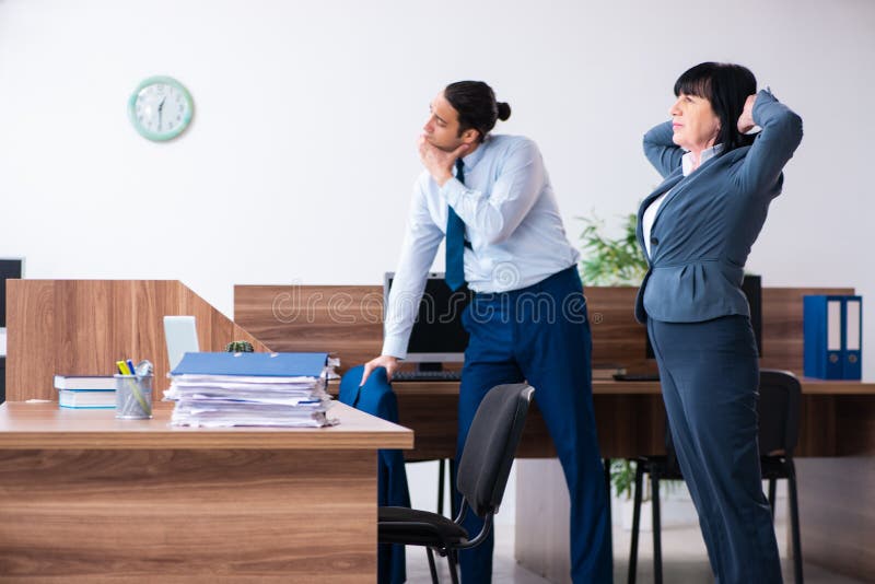 Two Employees Doing Sport Exercises in the Office Stock Image - Image ...