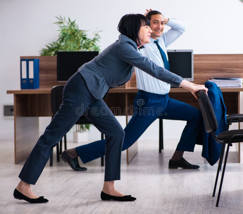 Two Employees Doing Sport Exercises in the Office Stock Image - Image ...