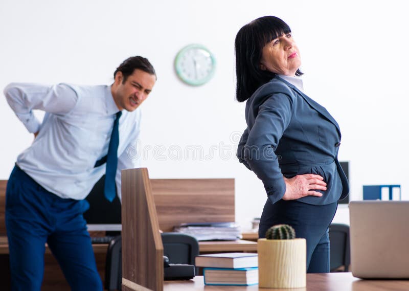 Two Employees Doing Sport Exercises in the Office Stock Photo - Image ...