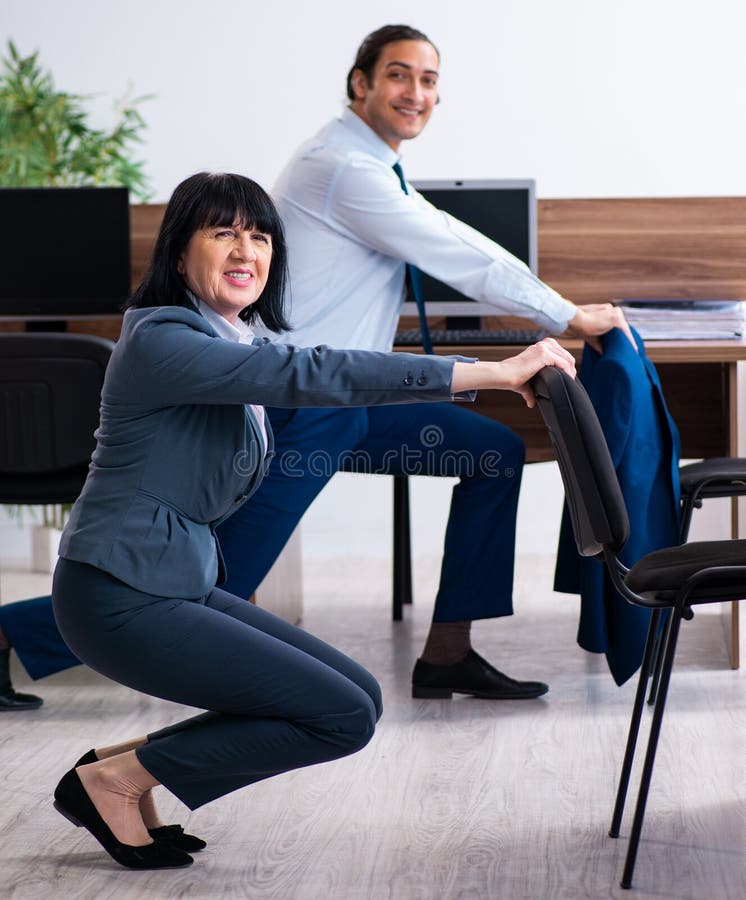 Two Employees Doing Sport Exercises in the Office Stock Image - Image ...
