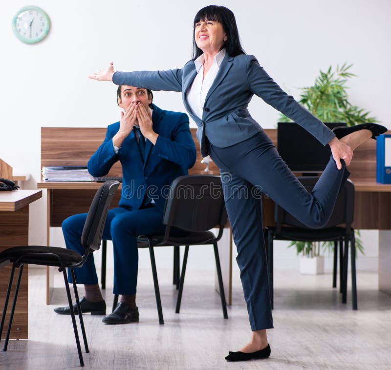 Two Employees Doing Sport Exercises in the Office Stock Photo - Image ...