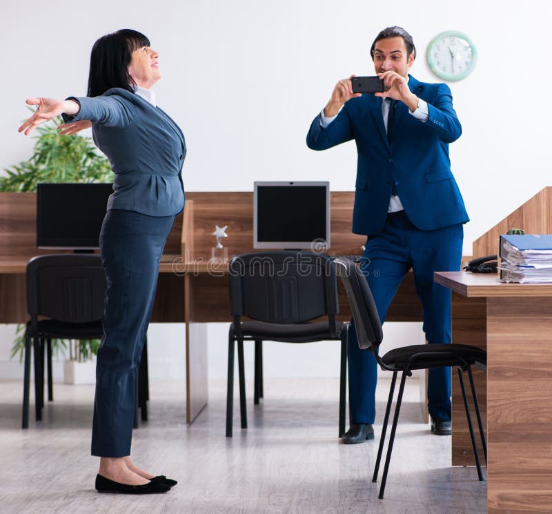 Two Employees Doing Sport Exercises in the Office Stock Image - Image ...
